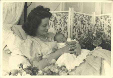 Jacqueline Aldine Leslie Castellani, Lady Killearn (b.c.1909) holding ...